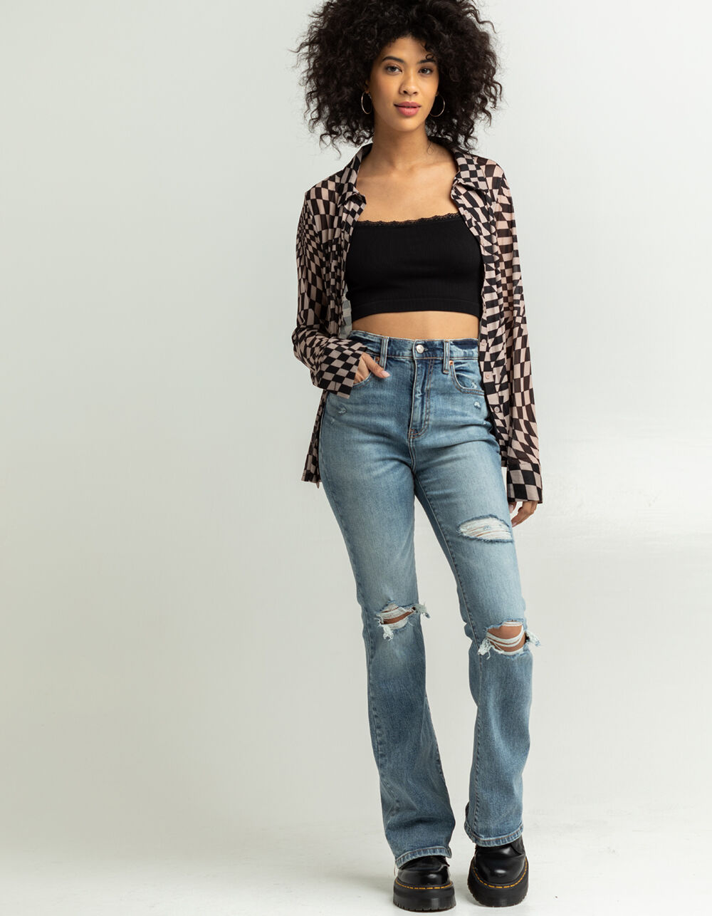 The Best Flare Jeans Outfit Ideas You'll Obsess Over